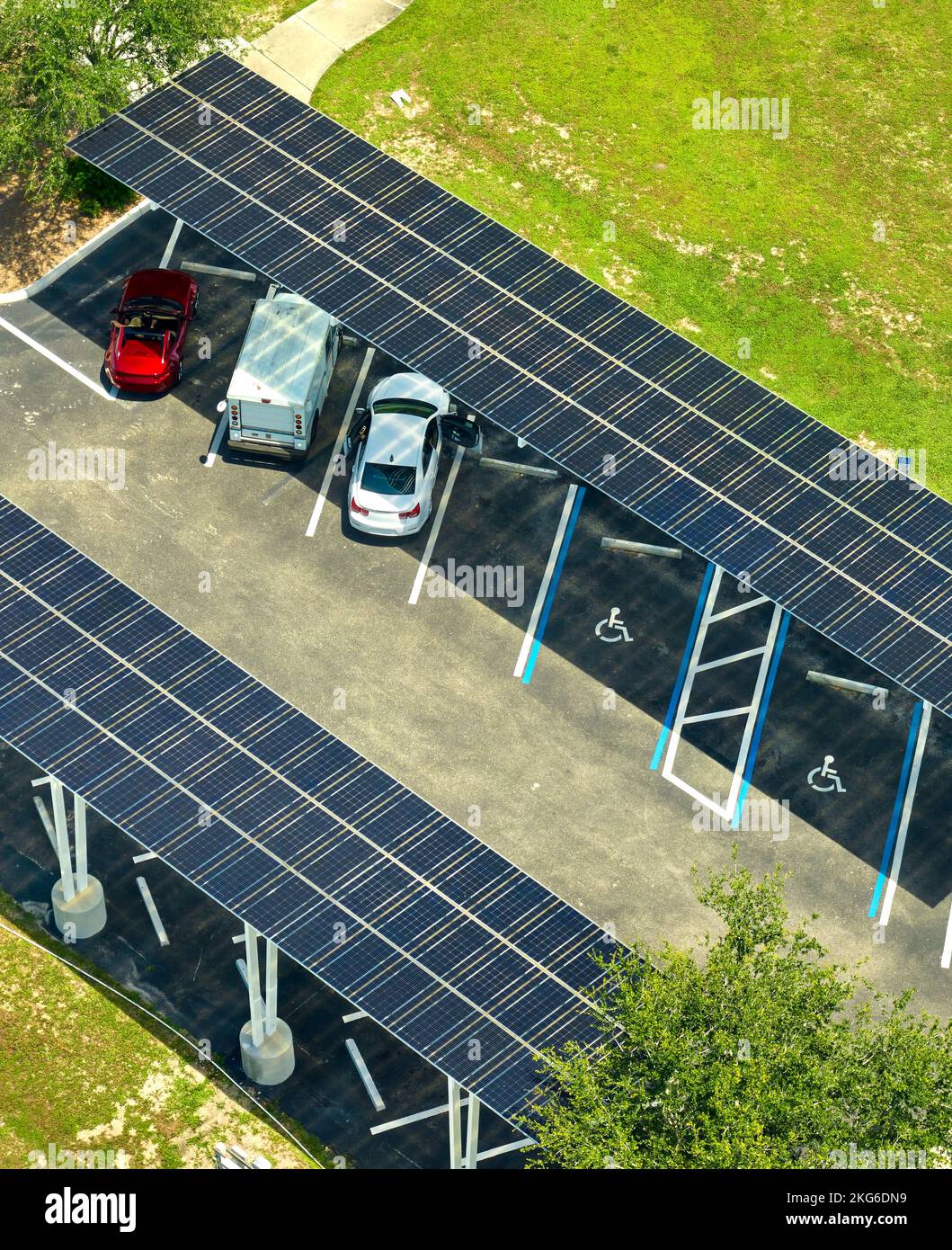 Solar panels installed over parking lot for parked cars for effective ...