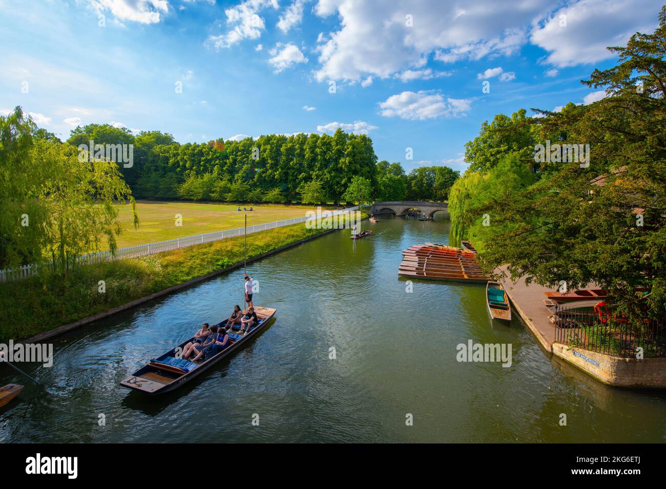 Punting on River Cam with Clare Bridge at the background in Cambridge ...