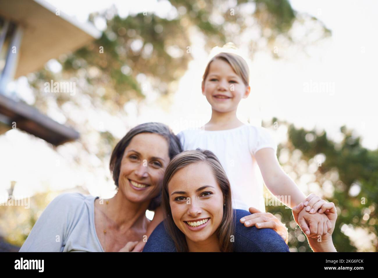 Enjoying the morning with her gandmother and mom. Portrait of a ...