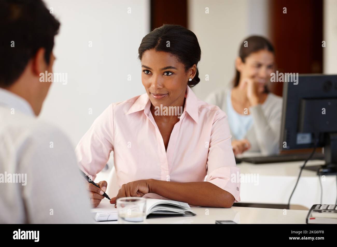 Shes keeping on top of the situation. an attractive african woman ...