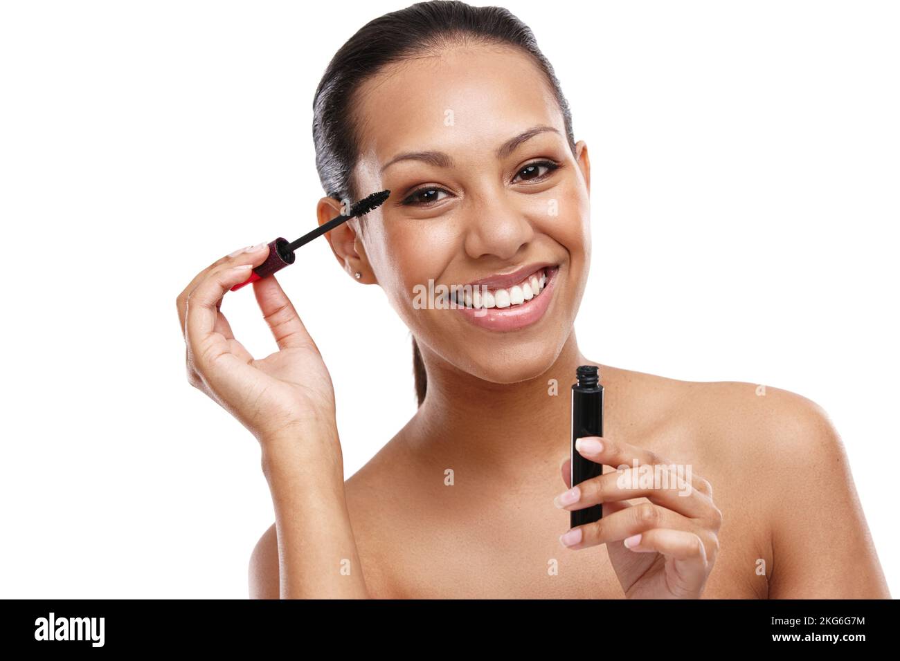You had me at mascara. a gorgeous young woman applying mascara in a ...