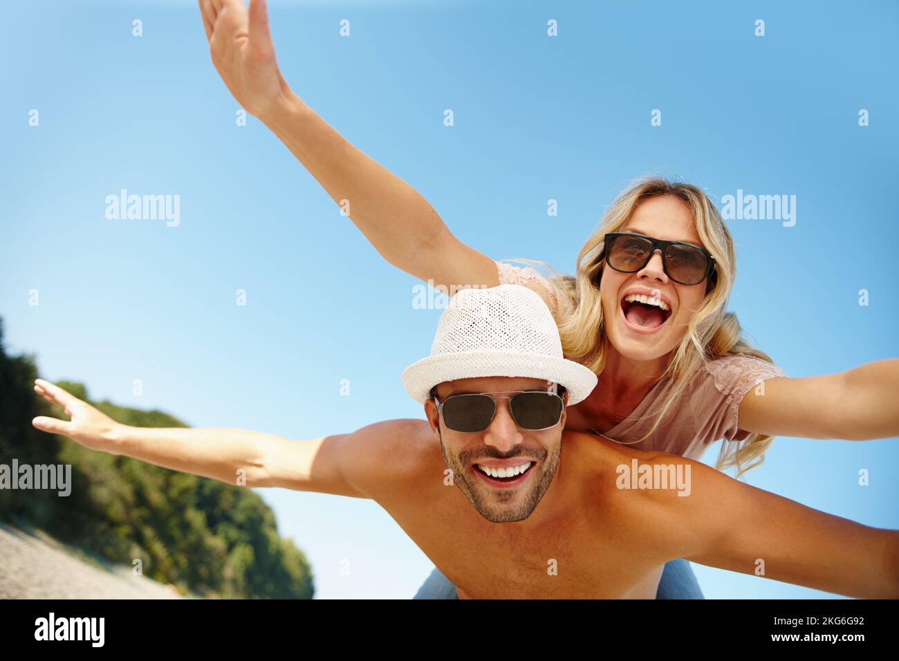 Life doesnt get better than this. a smiling young man giving his ...