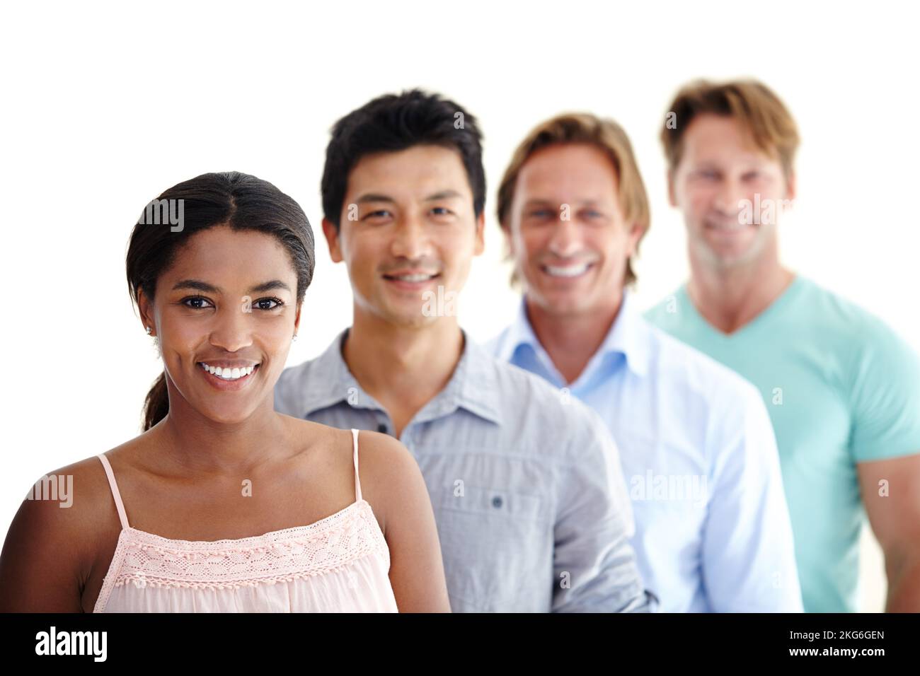 Standing together in a diverse world. Four smiling adults of varying ...