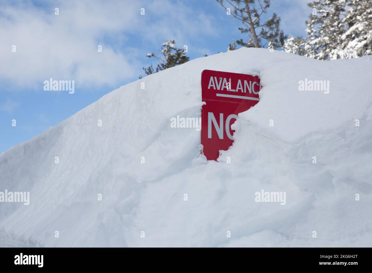 Avalanche warning no stopping sign in Sierra Nevada mountains with a ...