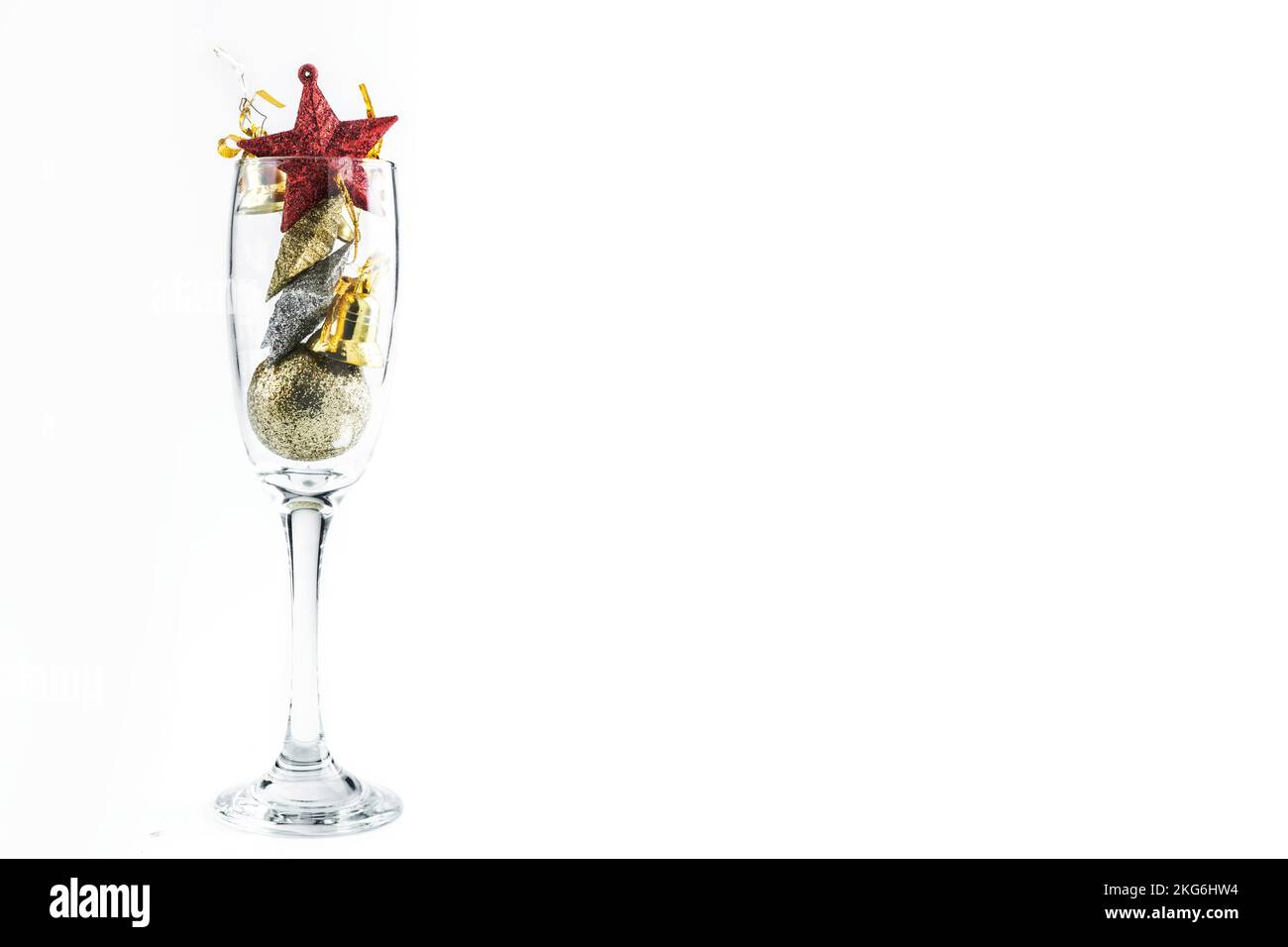 Champagne glass with Christmas decorations on white background Stock ...