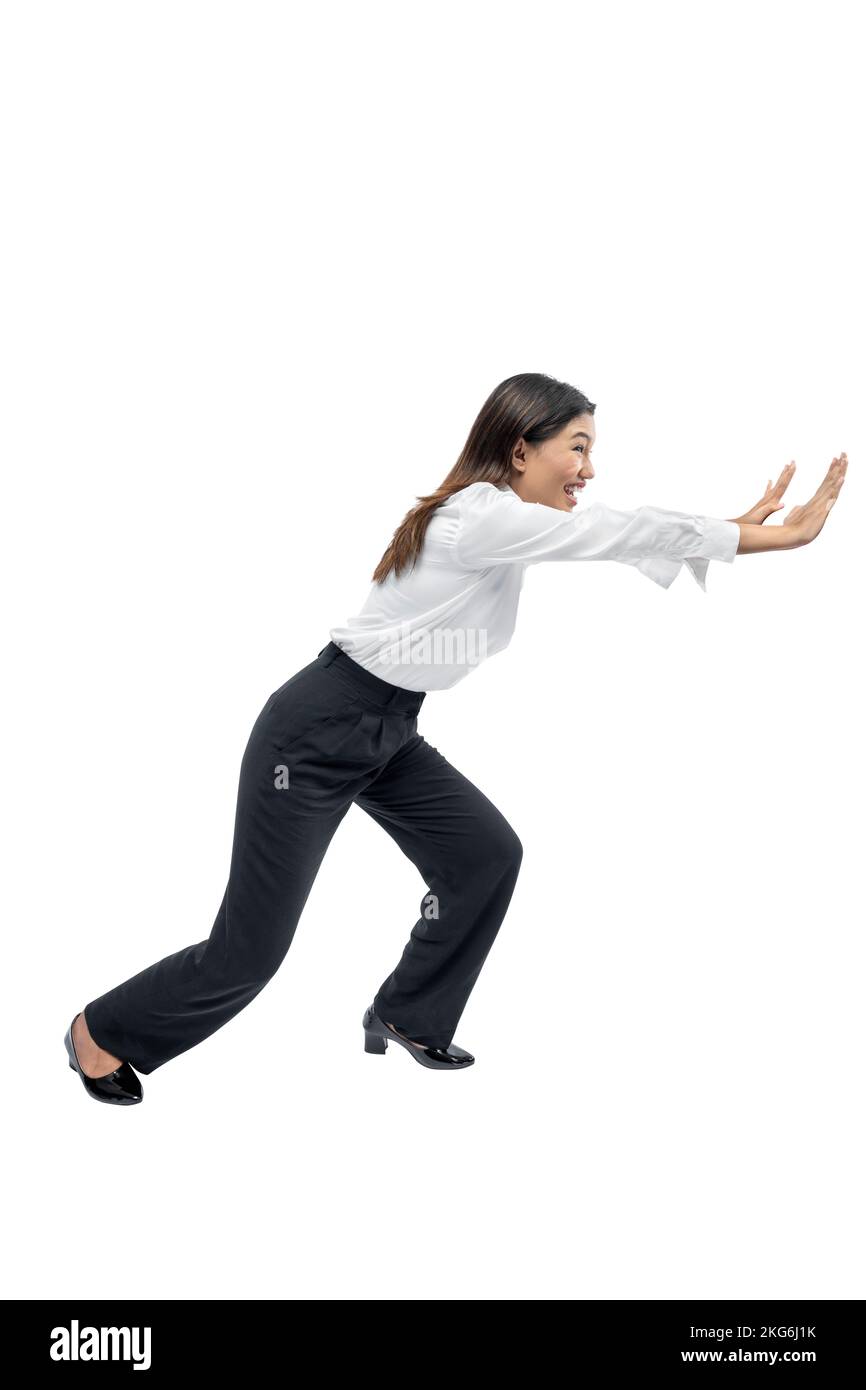 Asian businesswoman pushing something isolated over white background ...