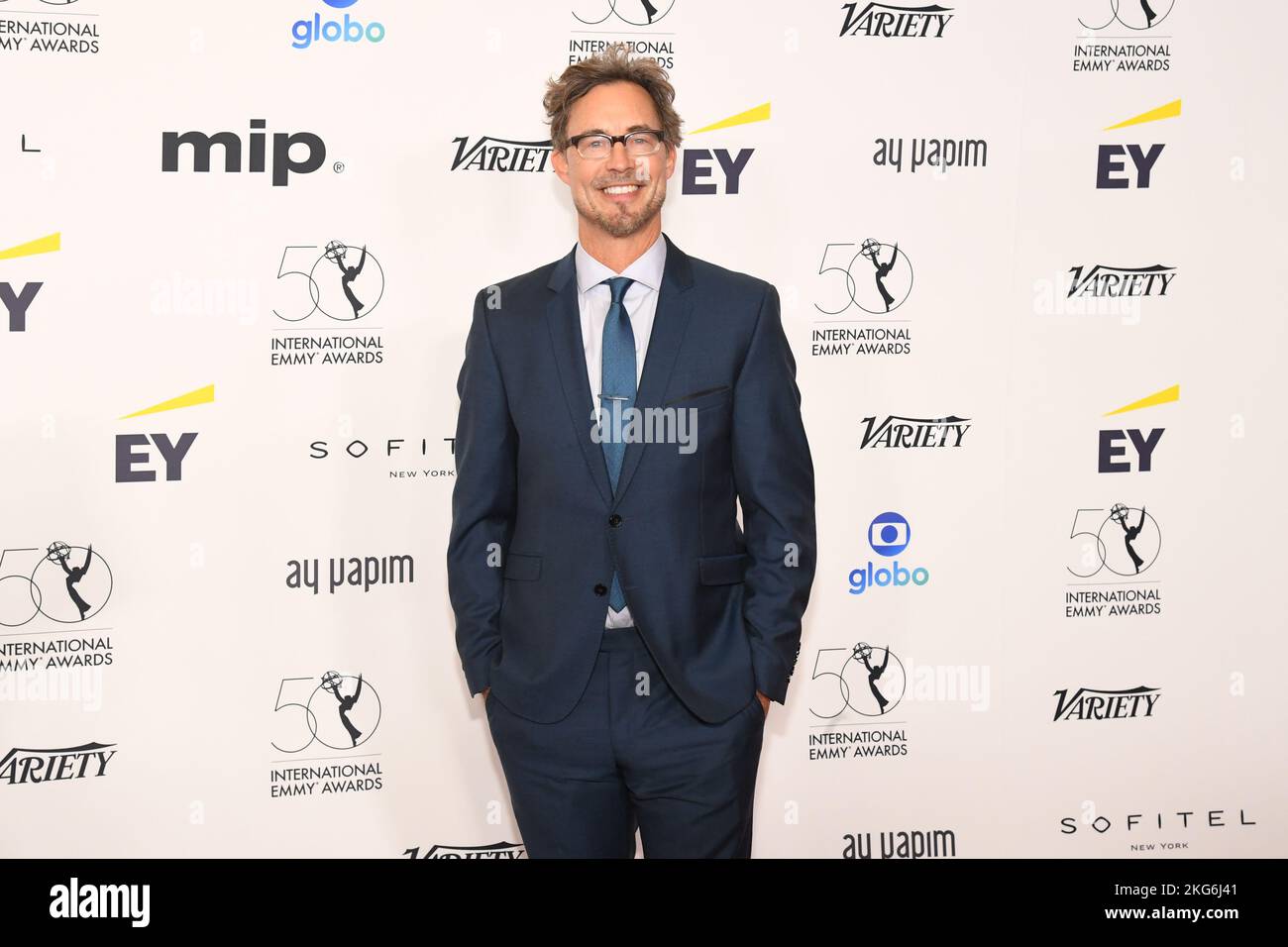 Tom Cavanagh walking the red carpet at the International Emmy Awards at ...