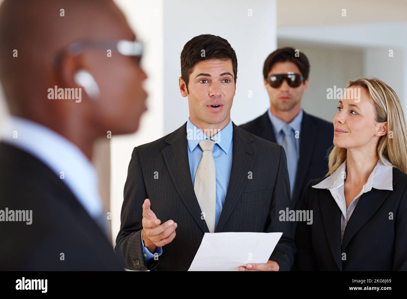Hes a respected public figure. a politician giving a presentation in ...