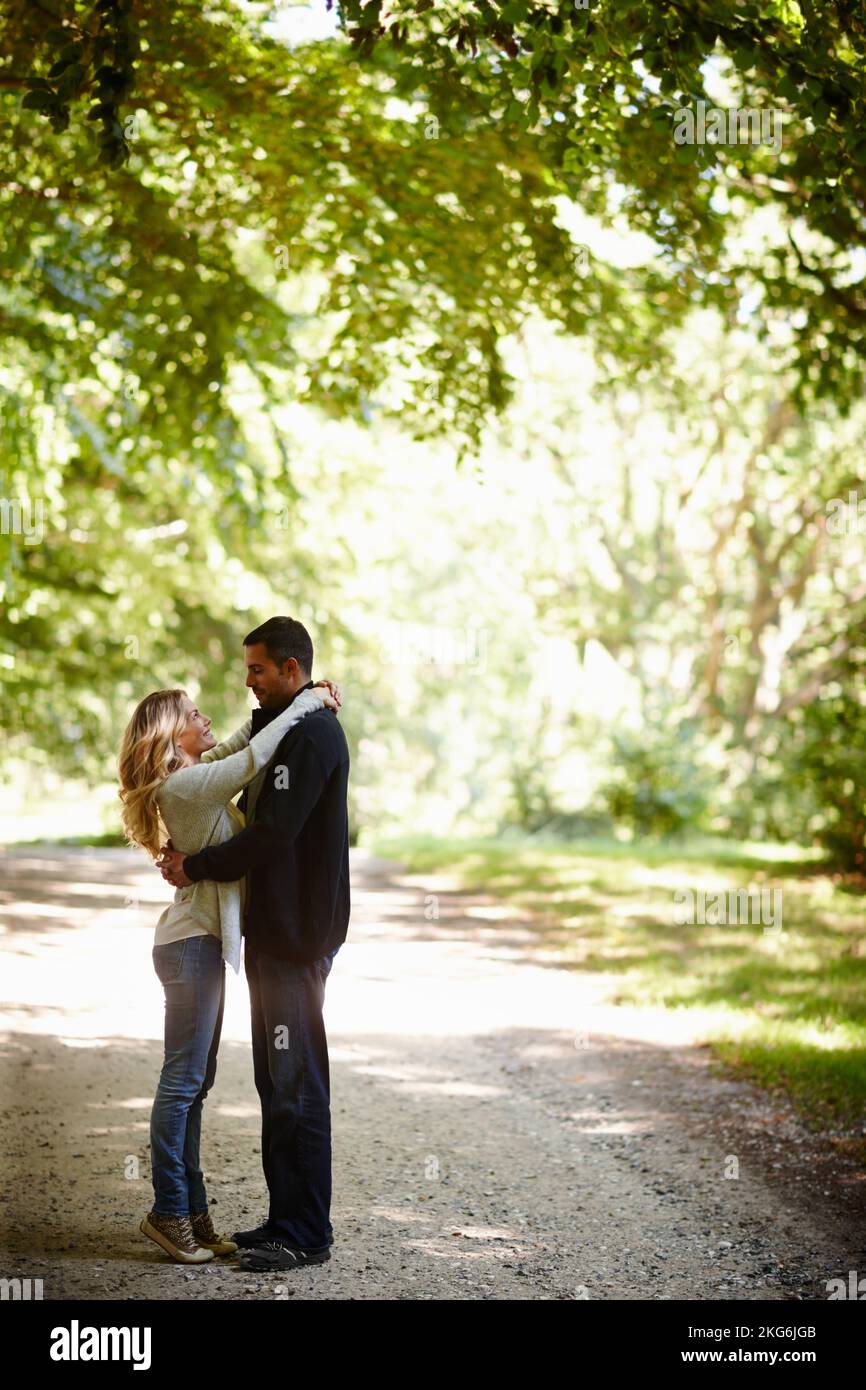 Taking a quiet romantic moment together. Full length shot of a young ...