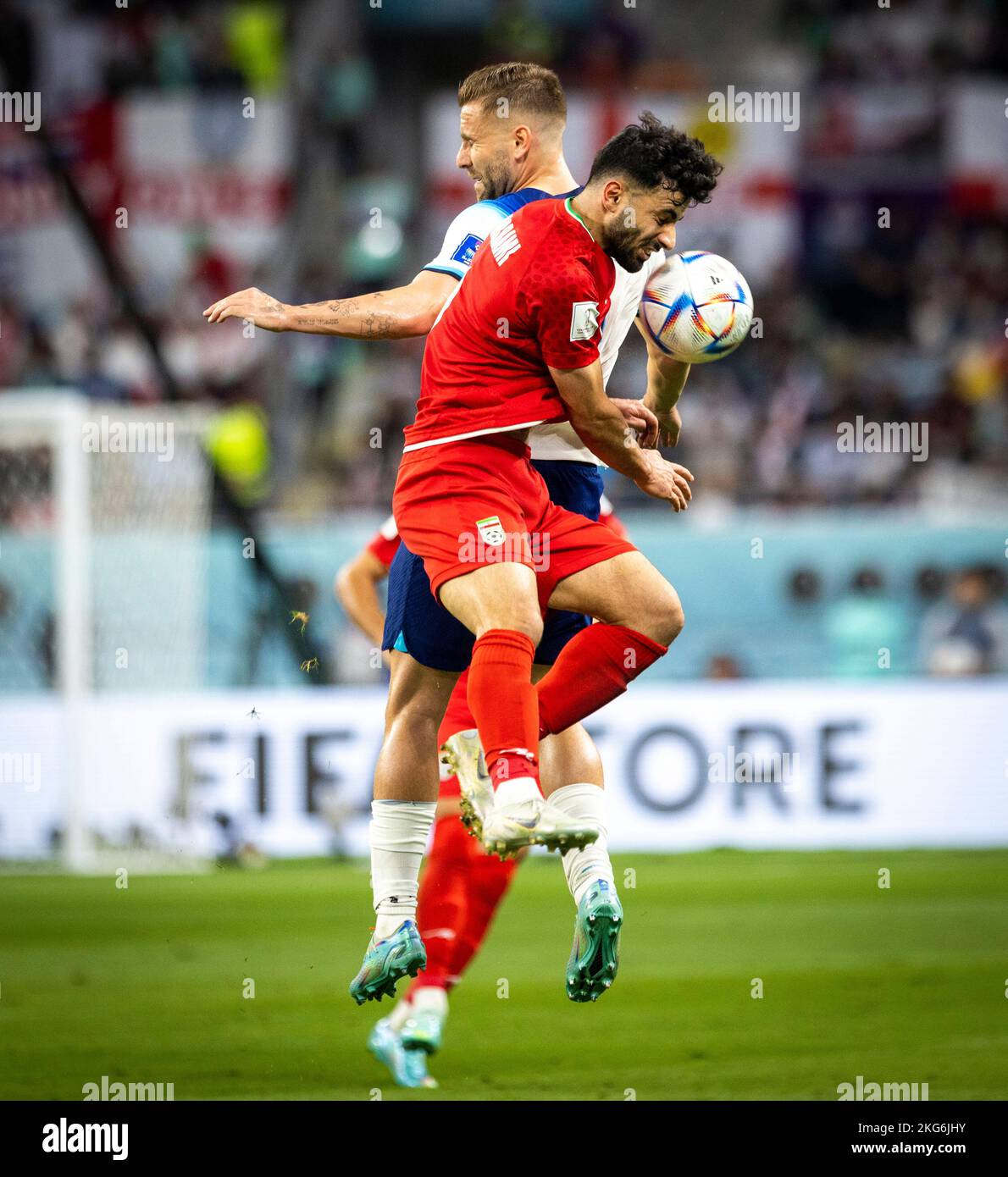 Doha, Qatar. 21st Nov, 2022. Sadegh Moharrami (Iran), Luke Shaw ...