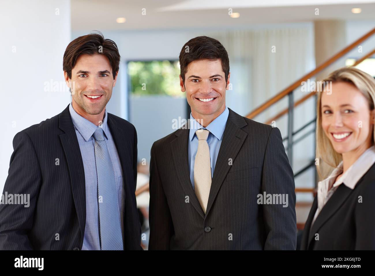 The best team in the business. Portrait of three business professionals ...