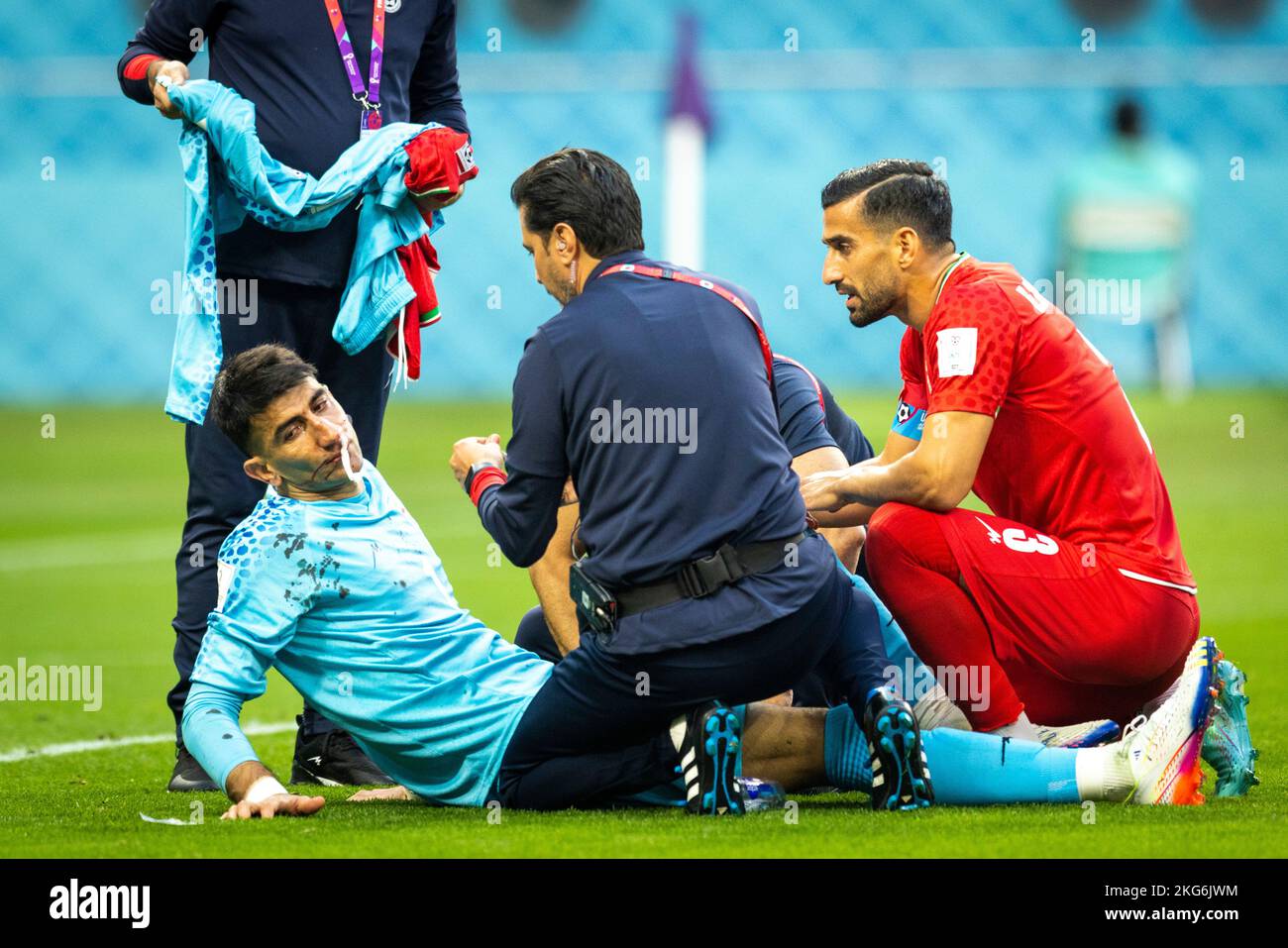 Doha, Qatar. 21st Nov, 2022. Torwart Alireza Beiranvand (Iran) blutet stark aus der Nase England ...