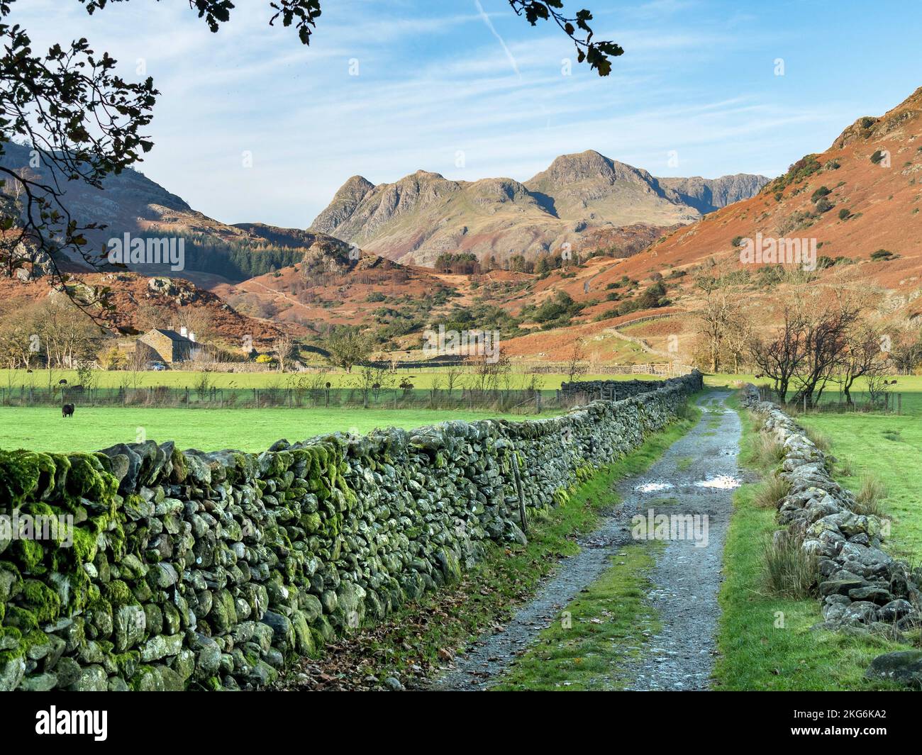 View from Little Langdale of the Langdale Pikes mountains with old dry ...
