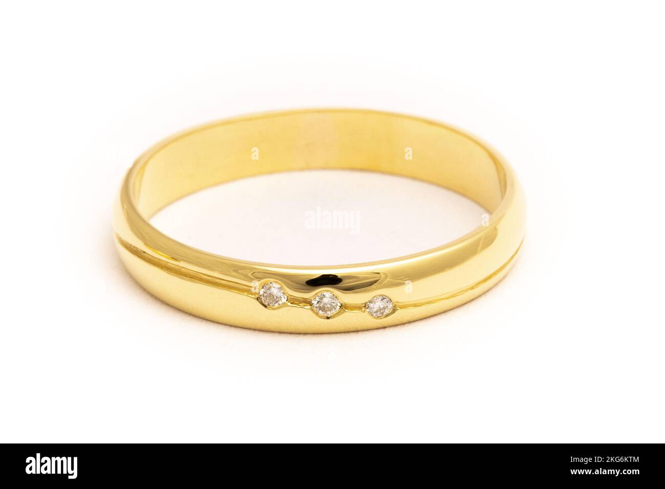 A gold ring isolated on a white background Stock Photo - Alamy