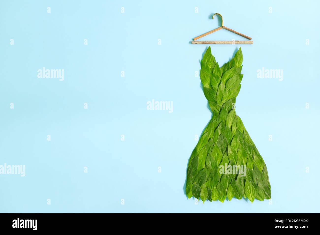 Sustainable and eco friendly fashion concept. Dress made of fresh green ...