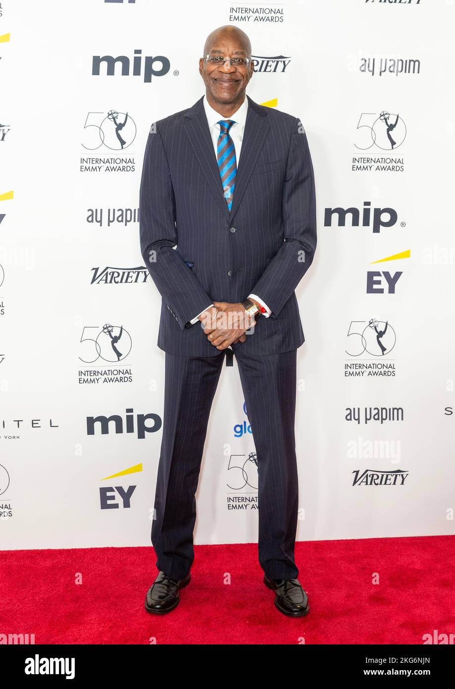 Dr. Edwin Moses attends 50th International Emmy Awards at Hilton hotel ...