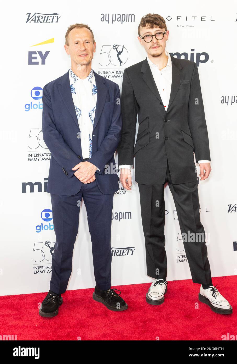 Marc Munden (L) attend 50th International Emmy Awards at Hilton hotel ...