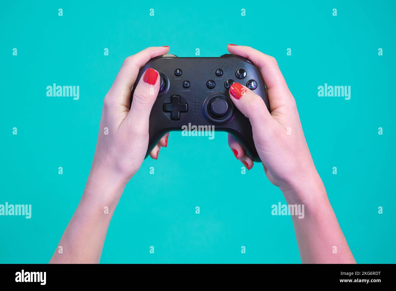 POV of female hands gaming with video game controller gamepad isolated ...
