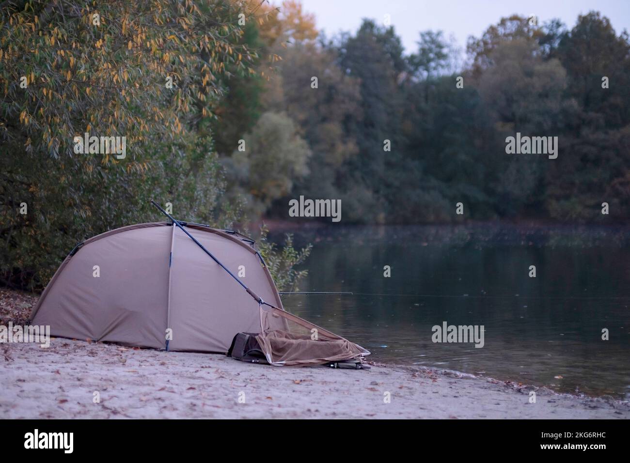Camping by the lake. Camping tents. Build a tent. Lake fishing. Gronau ...