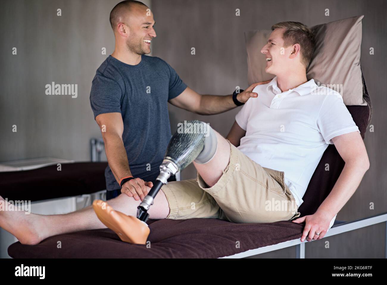 Getting some much needed physio. a physiotherapist and his patient ...