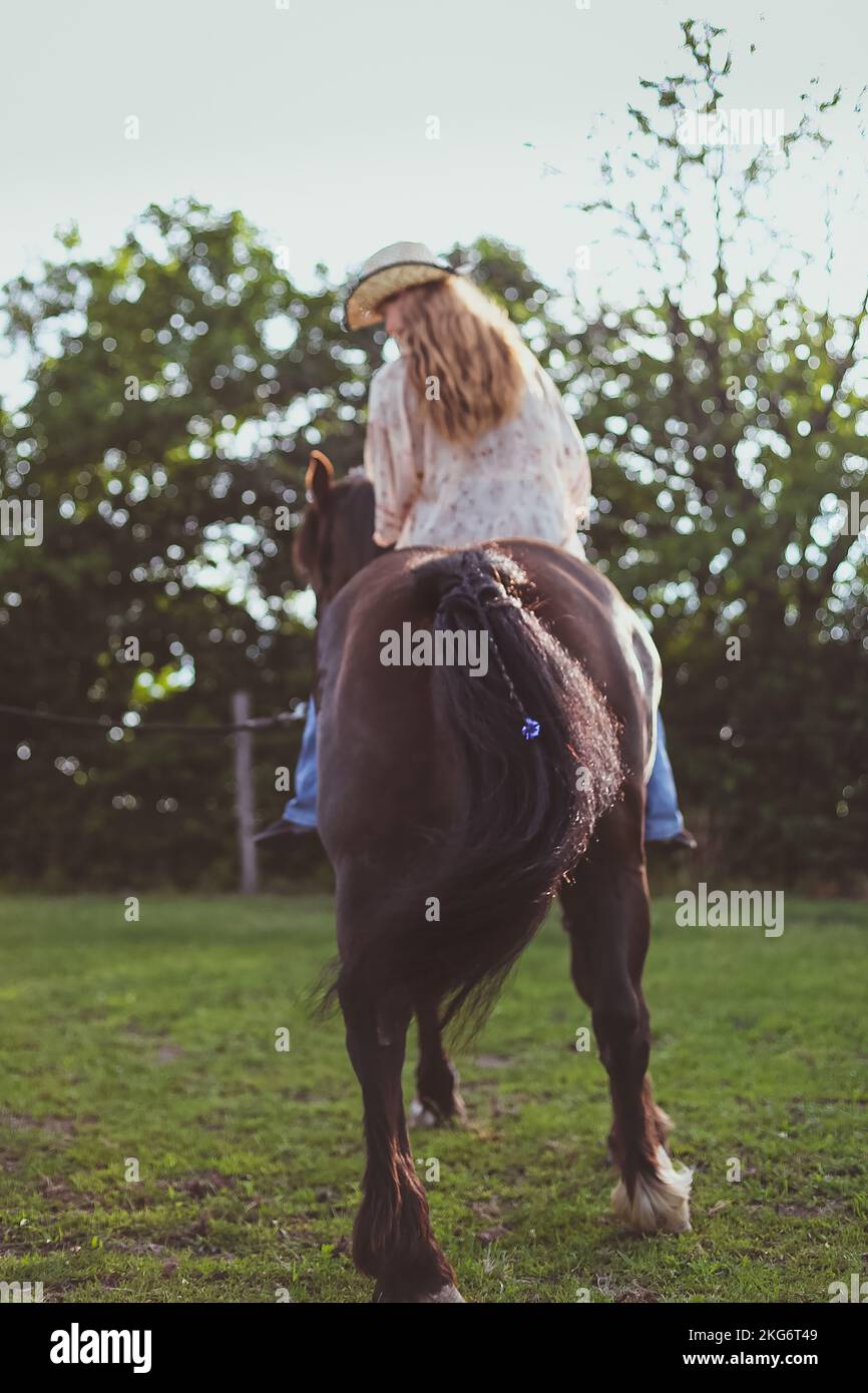 Woman riding horse scenic photography Stock Photo - Alamy