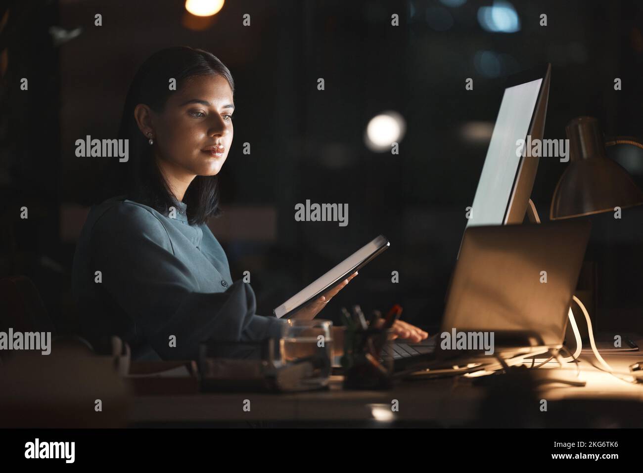 Computer tech, night and woman with tablet working on database ...