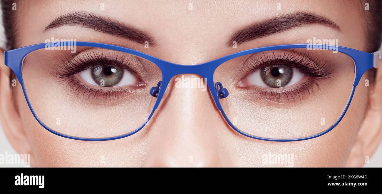 Woman with long eyelashes in eyeglasses. Vision correction. Poor ...