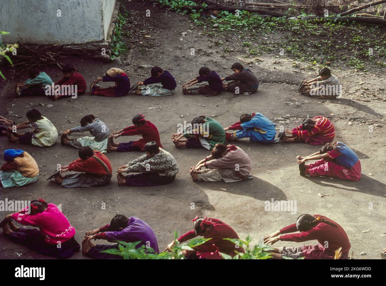 Girl students doing exercise in school ground at Ghanghria is a small ...
