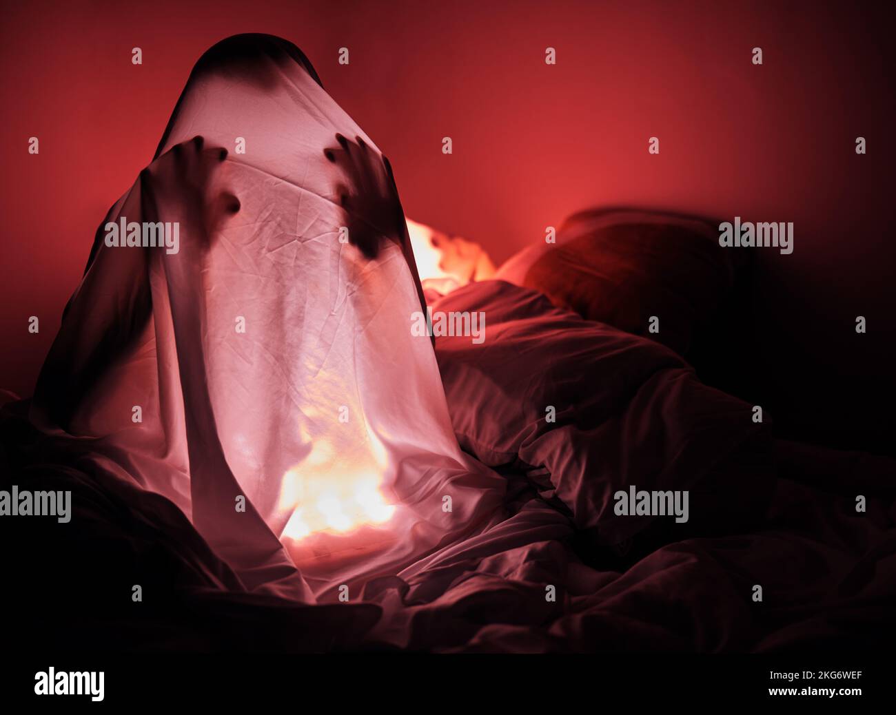 Ghost, sheet and red light in bedroom for scary story, horror and evil ...