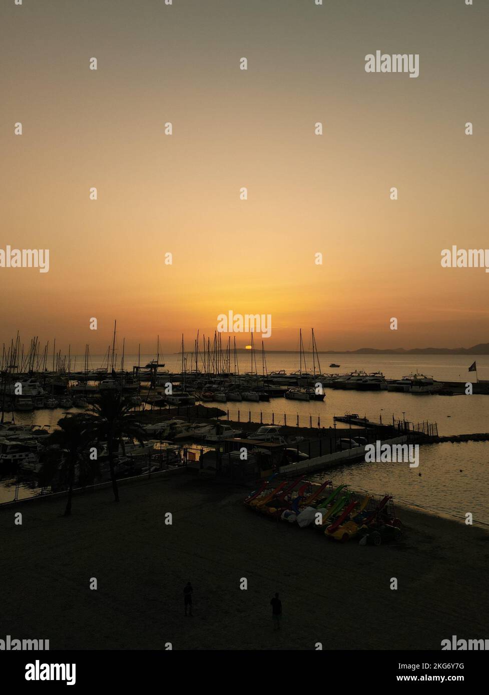 A beautiful view of yachts moored in the marina at sunset Stock Photo ...