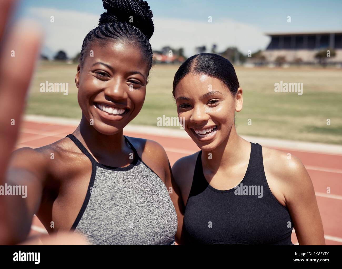 Friends, selfie and running with women on stadium track for training ...