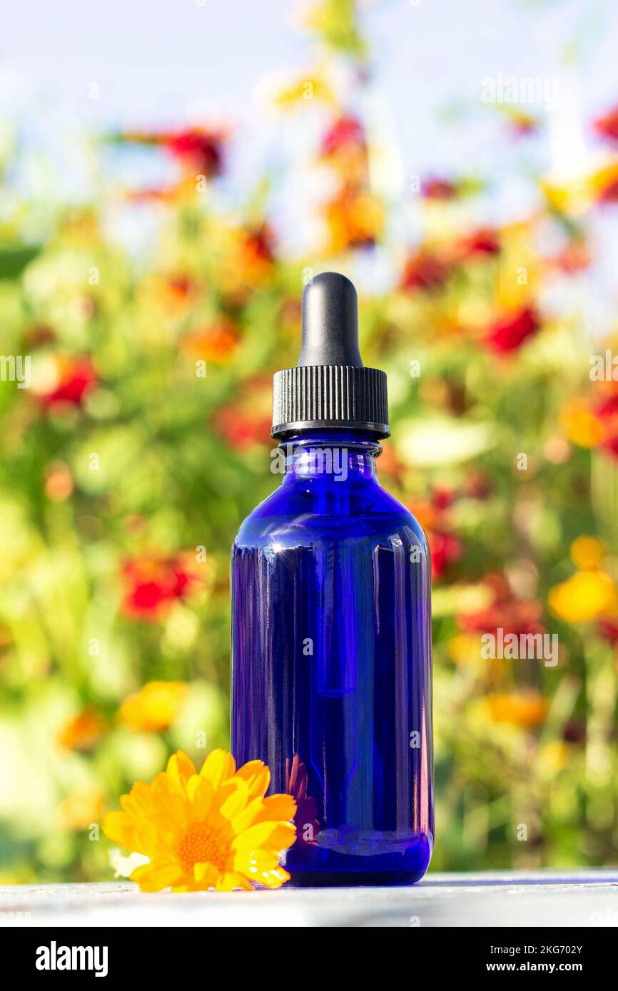 Blue glass dropper bottle hi-res stock photography and images - Alamy