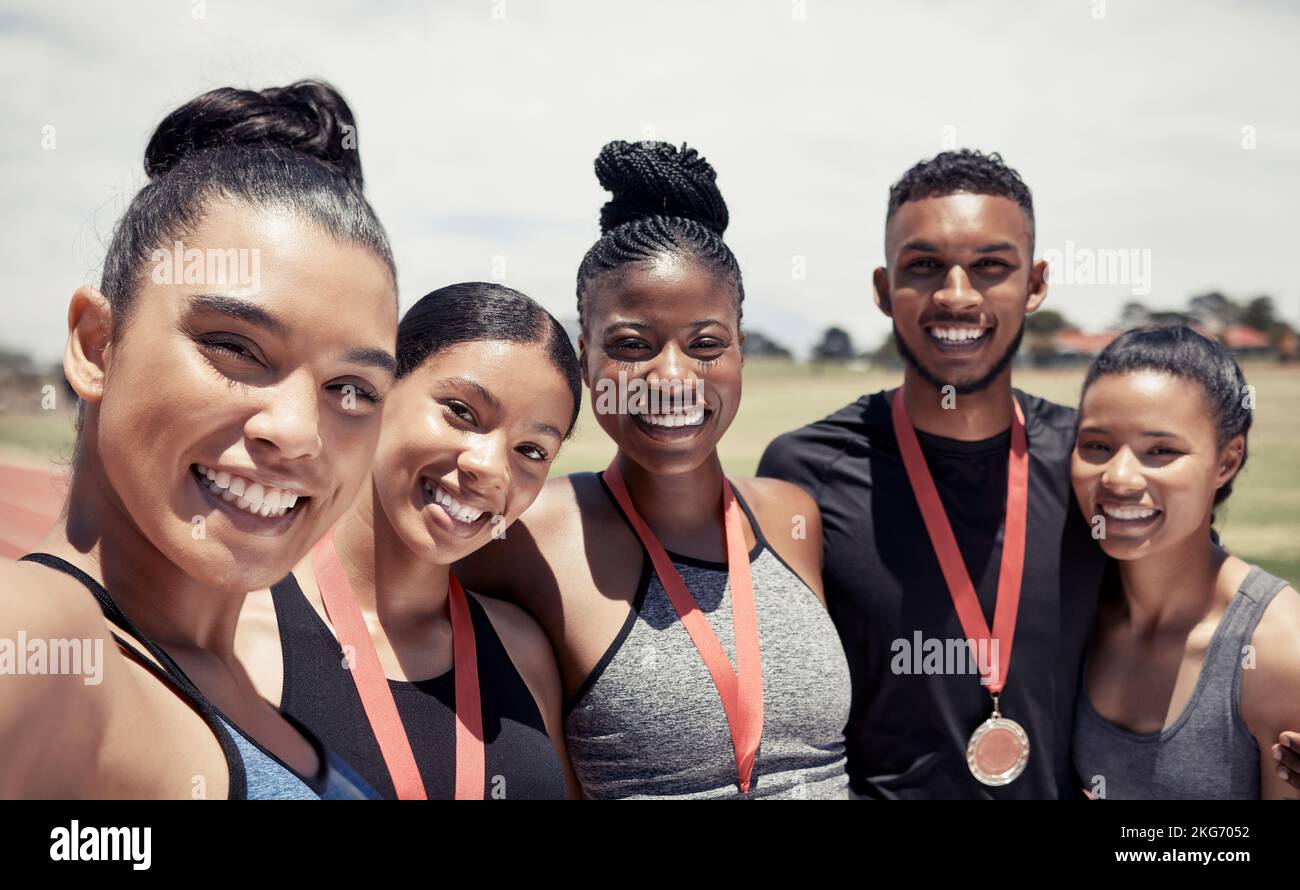 Women, man and running track team with medals in fitness, workout or ...
