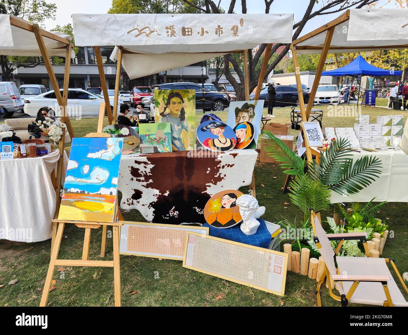A music market activity was held on the lawn of Riverside Park in ...