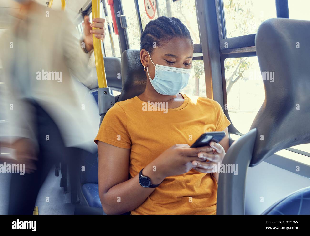 Bus travel, covid and black woman, smartphone and social media, reading ...