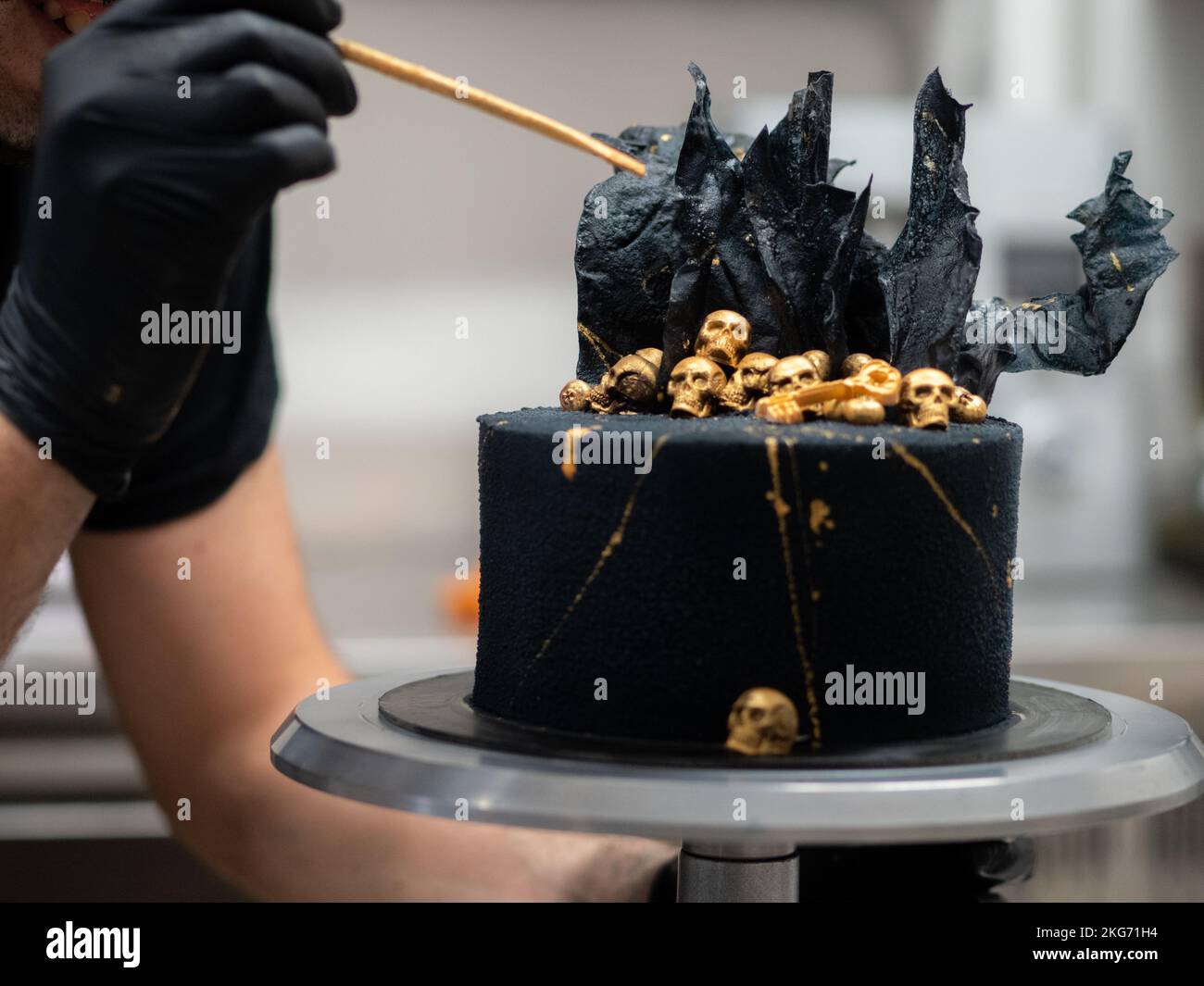 pastry chef finishing horror black muertos birthday cake decorating ...