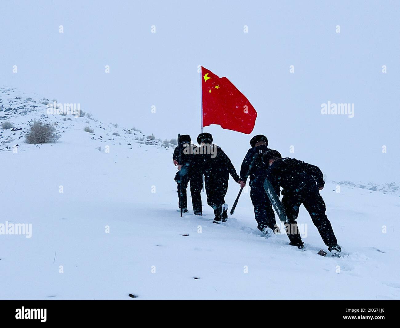 ALTAY, CHINA - NOVEMBER 21, 2022 - Police patrol over a snowy mountain ...