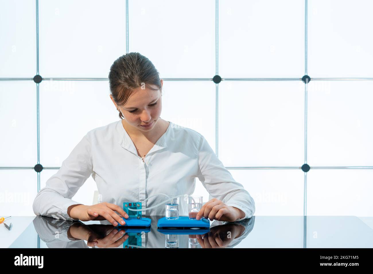 schoolgirl student studying hydrogen fuel cell at physics lesson Stock ... schoolgirl student studying hydrogen fuel cell at physics lesson Stock ...