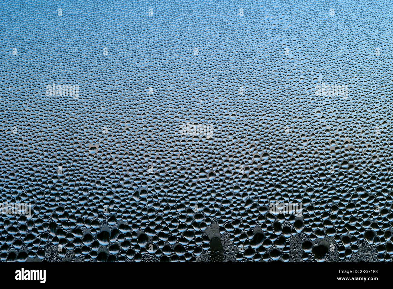 raindrops on the window glass with sparkles of street light Stock Photo ...