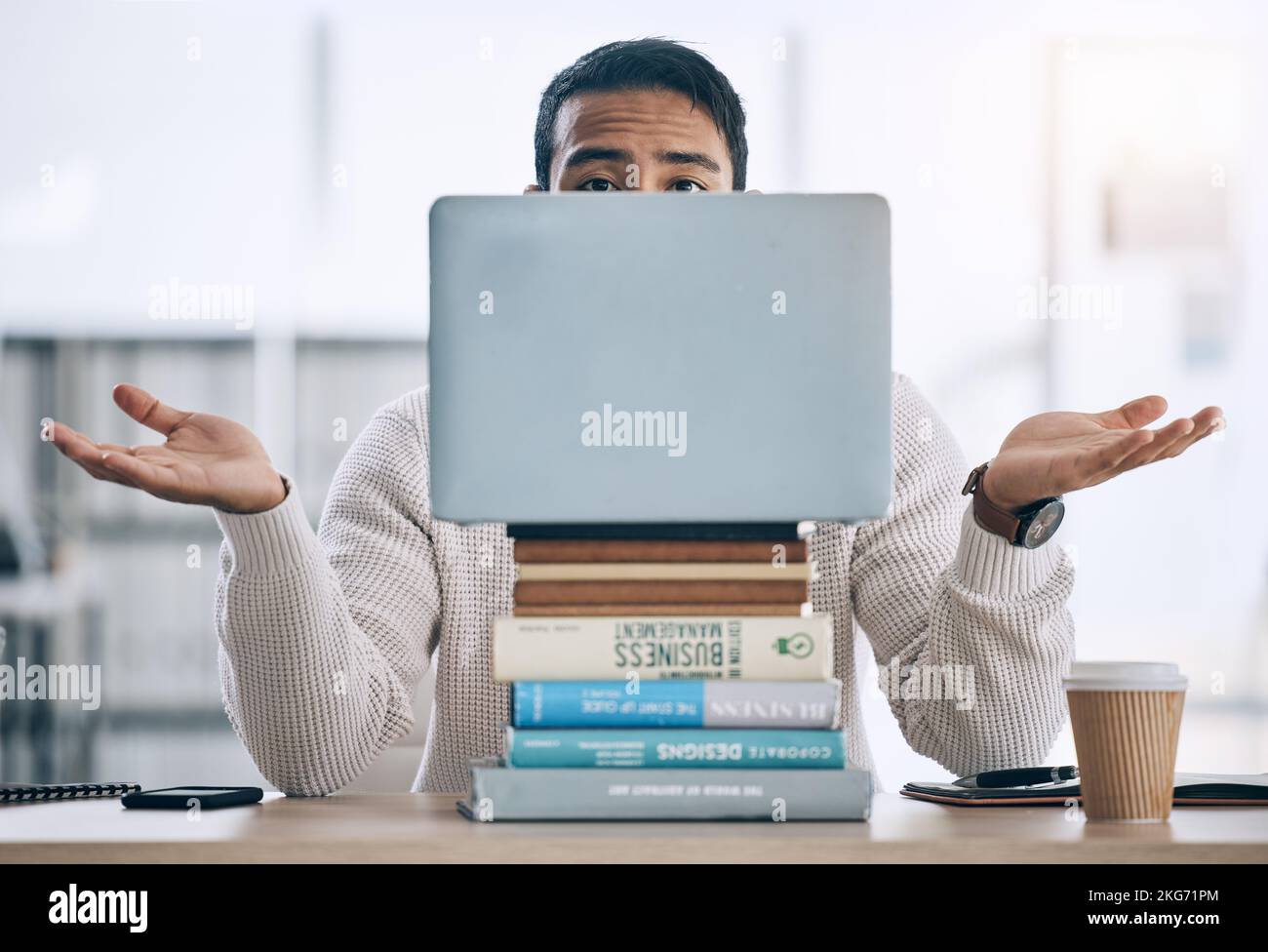 Laptop, books and studying man with confused, stress or decision for ...