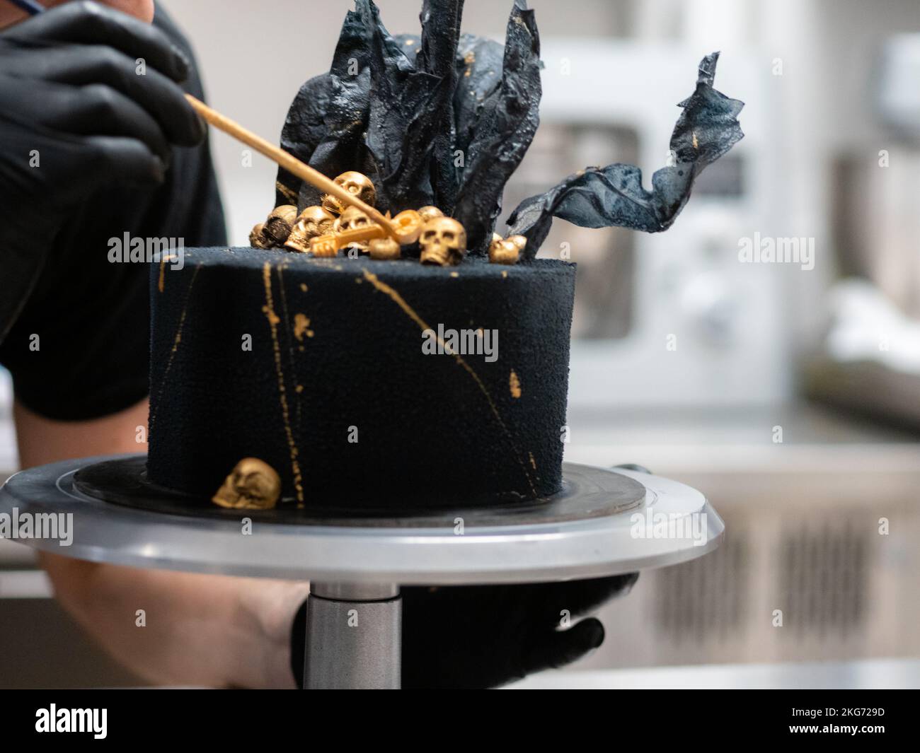 pastry chef finishing horror black muertos birthday cake decorating ...