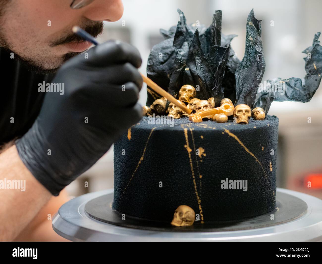 pastry chef finishing horror black muertos birthday cake decorating ...