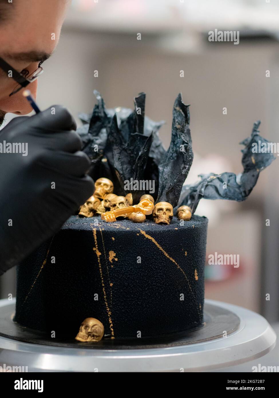 pastry chef finishing horror black muertos birthday cake decorating ...