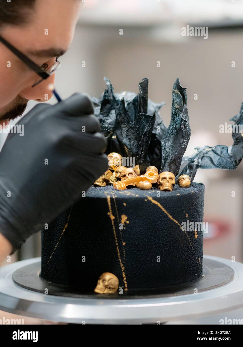 pastry chef finishing horror black muertos birthday cake decorating ...