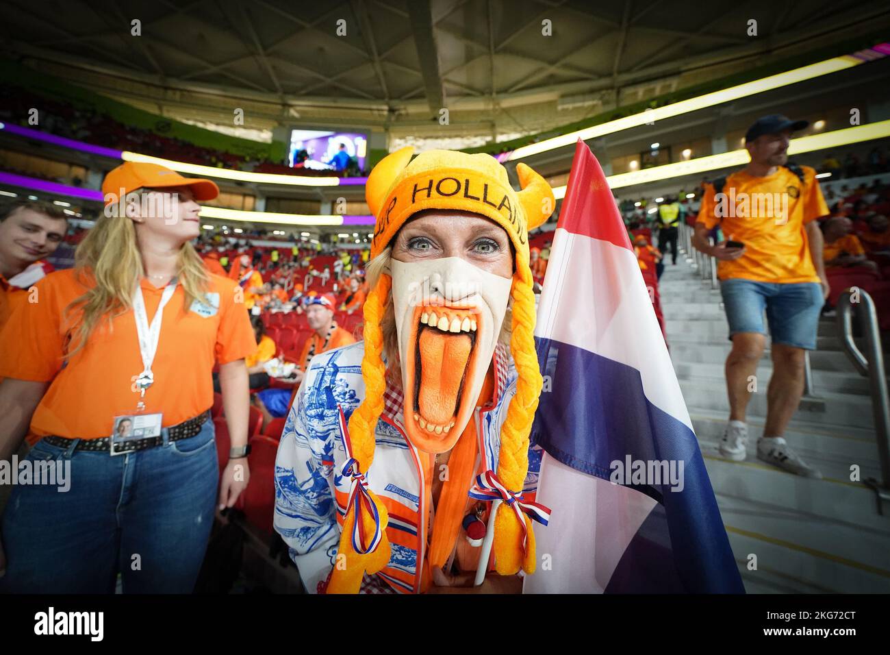 DOHA, QATAR - NOVEMBER 21: Supporter of Netherlands wearing a mask and ...
