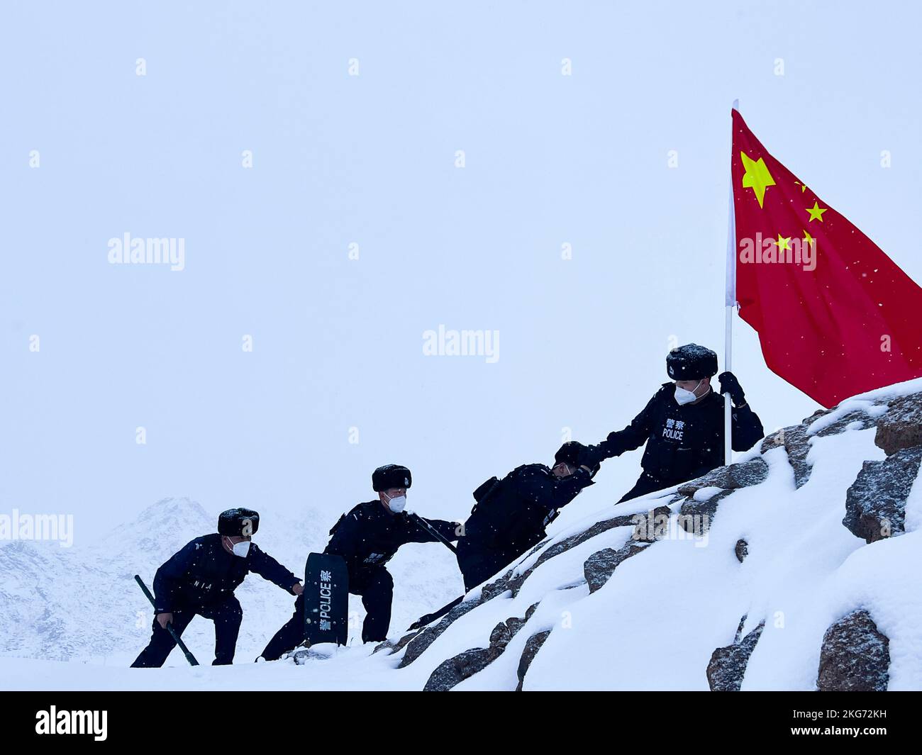 ALTAY, CHINA - NOVEMBER 21, 2022 - Police patrol over a snowy mountain ...