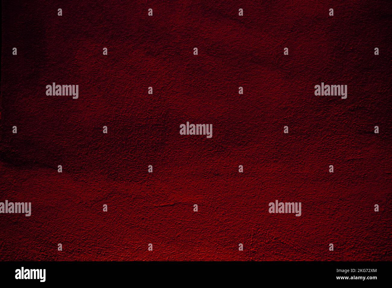 crimson red colored abstract wall background with textures of different ...