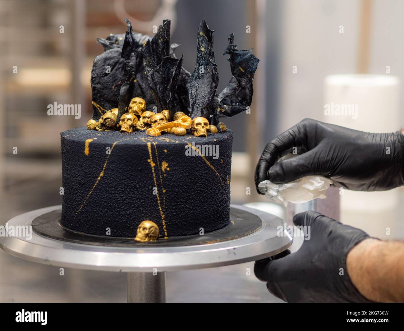 pastry chef finishing horror black muertos birthday cake decorating ...