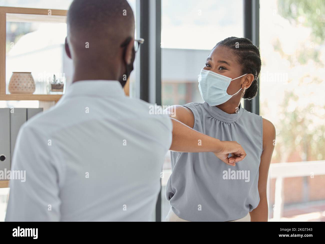 Business people, covid and elbow greeting for social distance or health ...