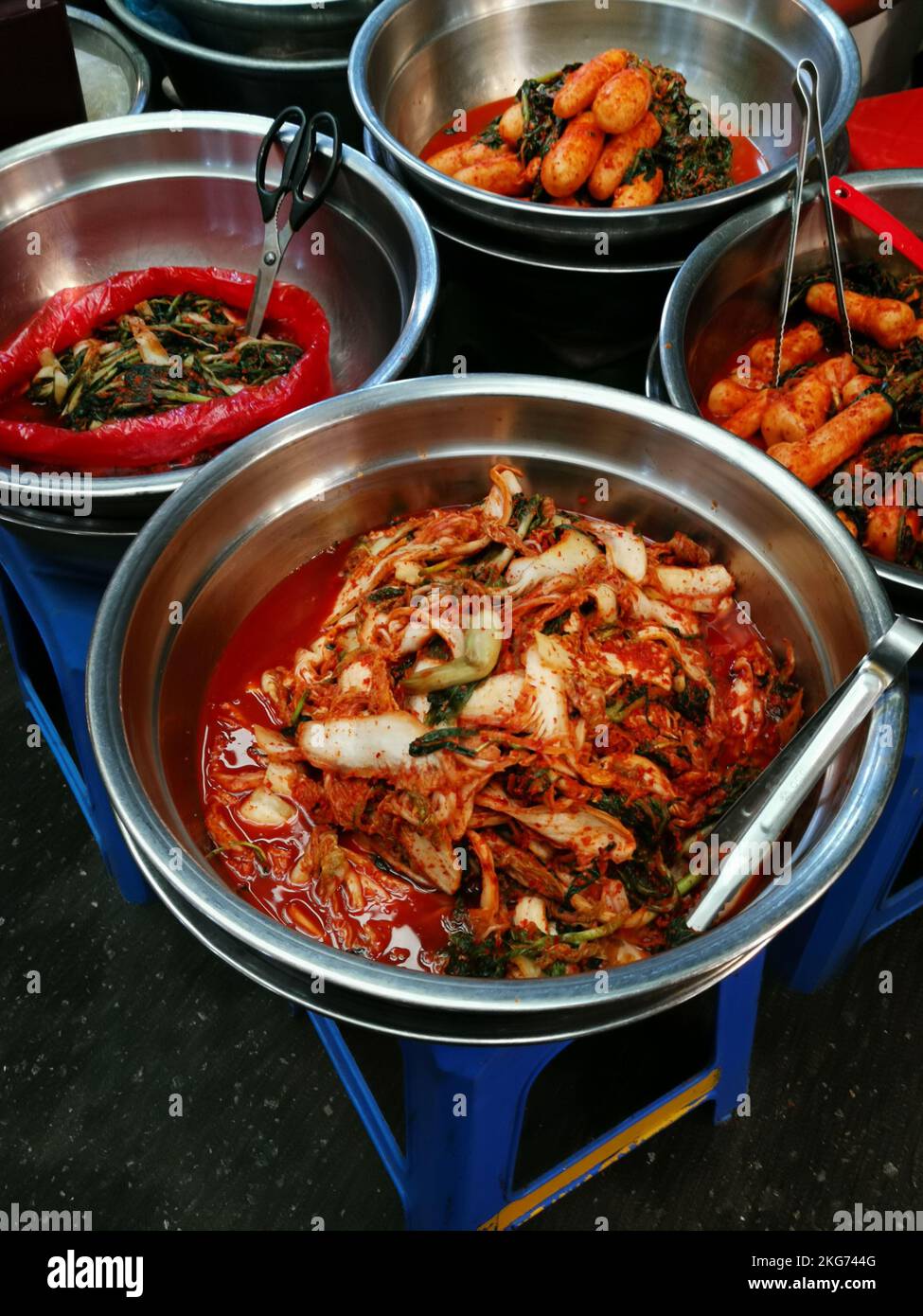 Silver pot of kimchi on display for sale in South Korean street market ...